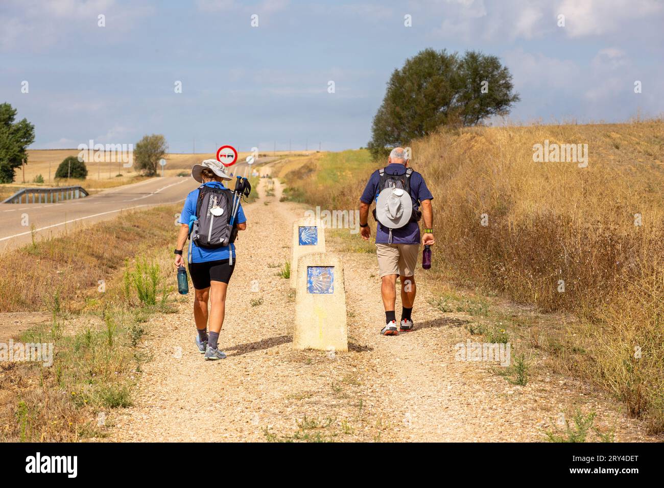 Pilgrims walking the Camino de Santiago pilgrimage route, the way of St ...