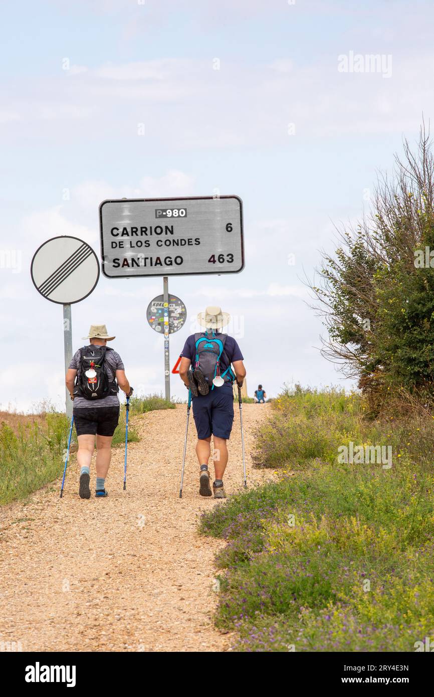 Pilgrims walking the Camino de Santiago pilgrimage route, the way of St ...