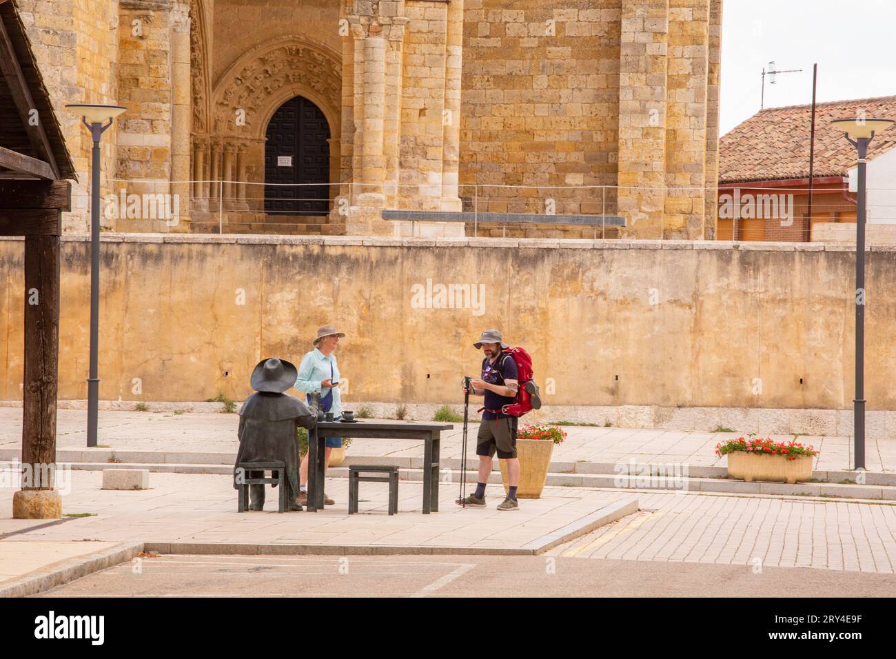 Pilgrims walking the Camino de Santiago pilgrimage route, the way of St ...