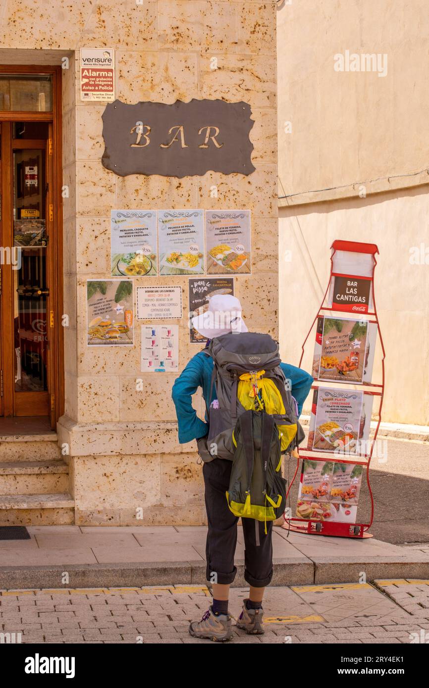 Pilgrims walking the Camino de Santiago pilgrimage route, the way of St ...