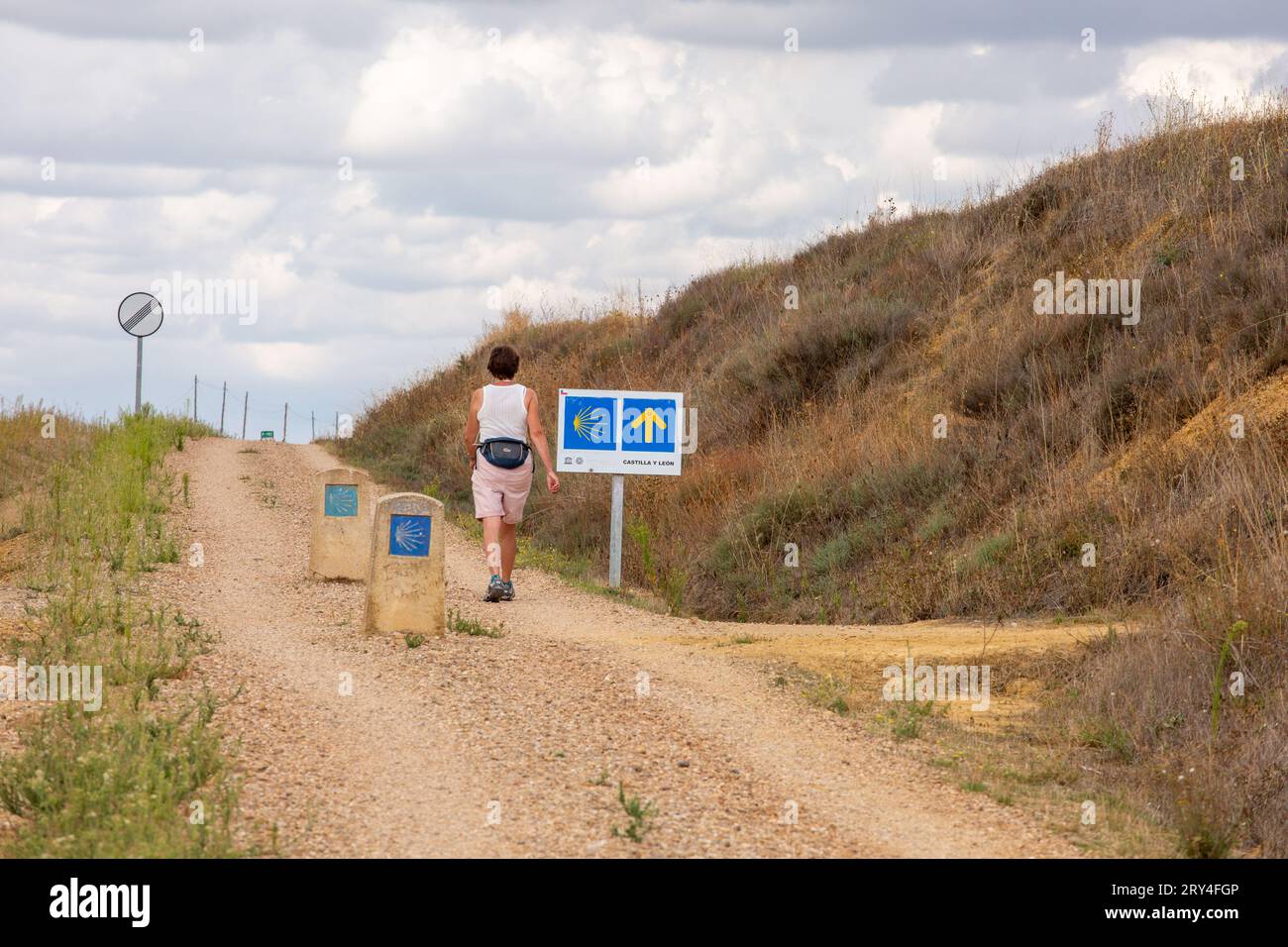 Pilgrims walking the Camino de Santiago pilgrimage route, the way of St ...