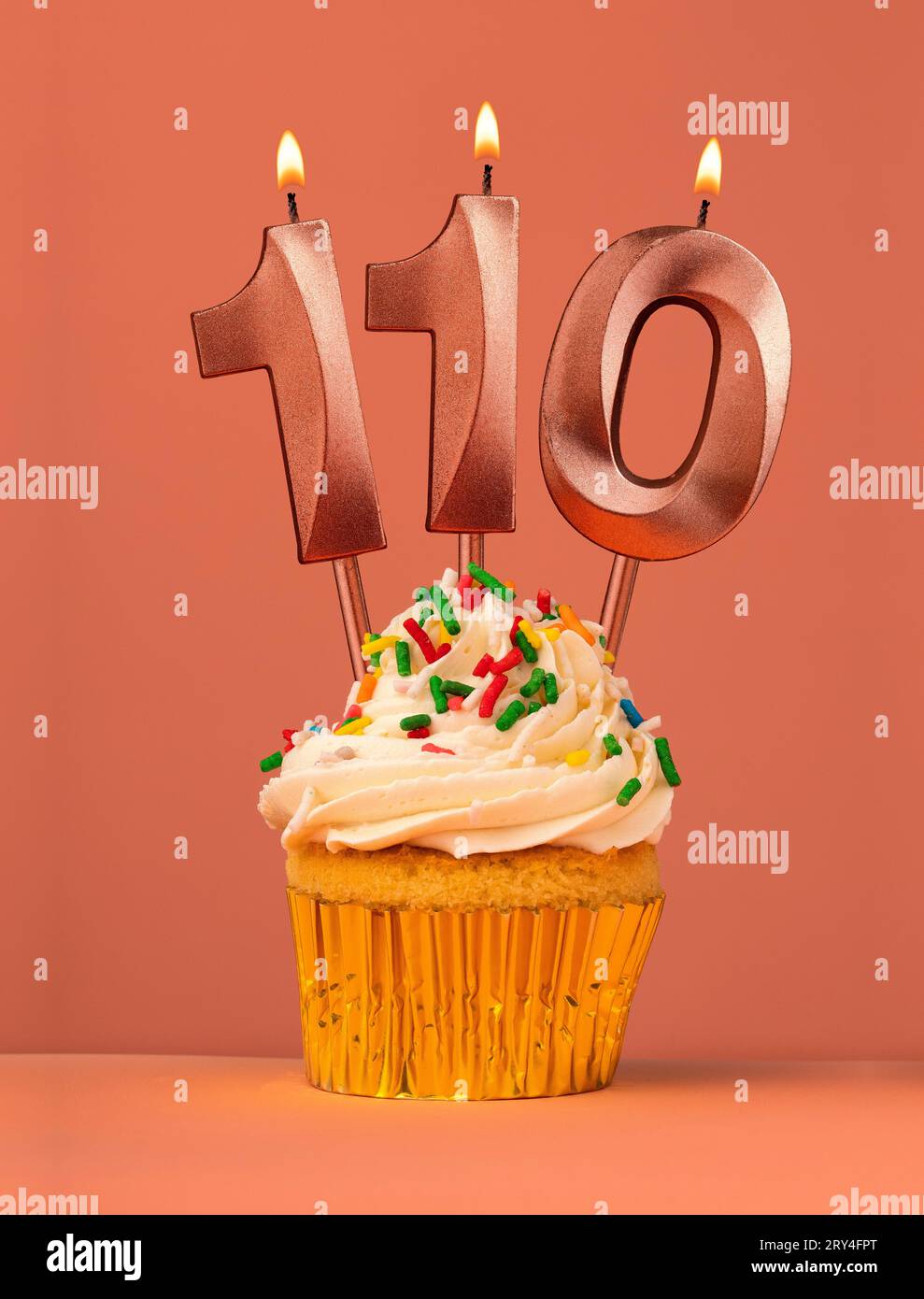 Candle number 110 - Cake birthday in coral fusion background Stock ...