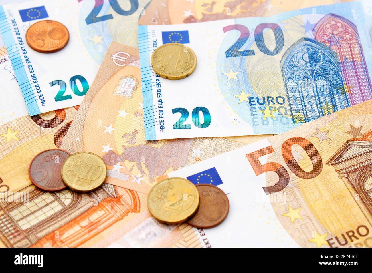 Euro bills and coins Stock Photo - Alamy