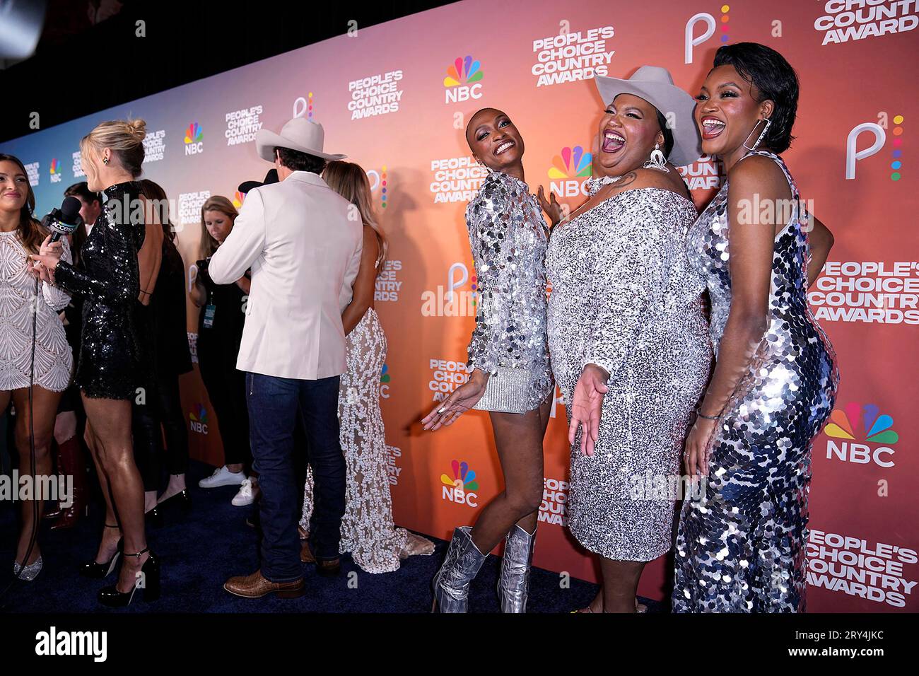 Trea Swindle, from left, Danica Hart, and Devynn Hart of Chapel Hart ...