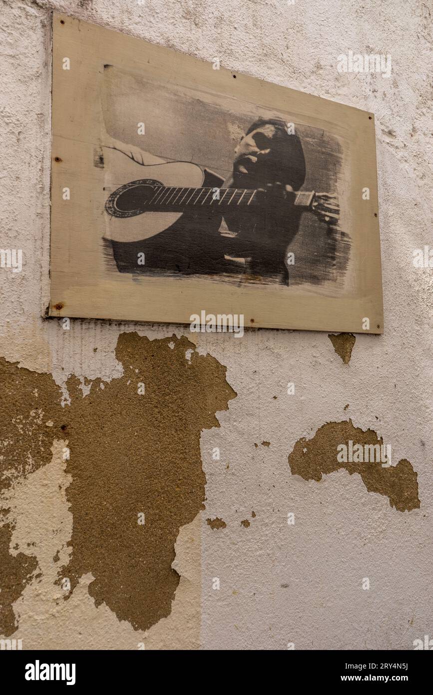 Pictures of famous fado singers on the walls of the traditional old ...