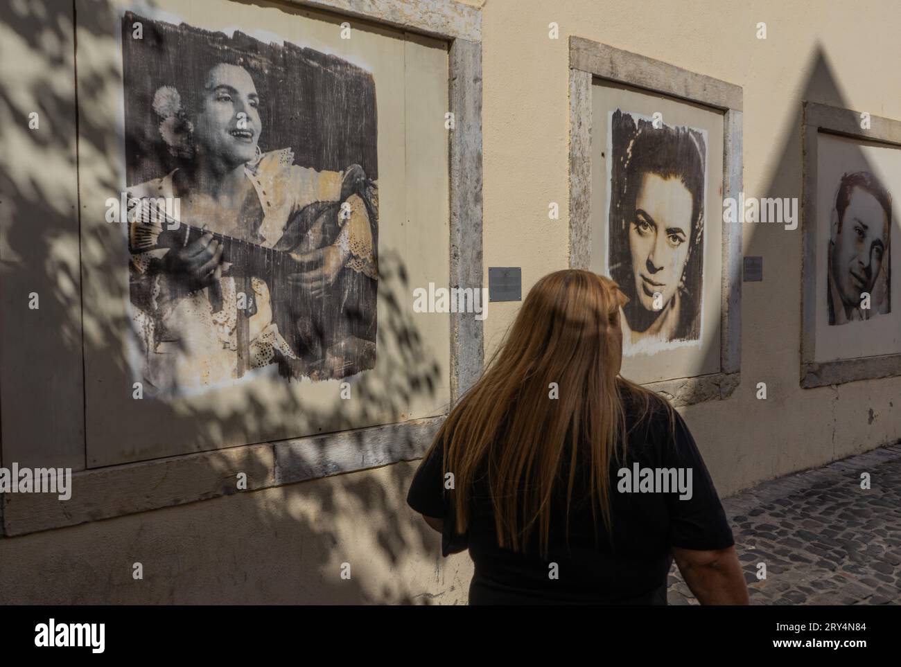 Pictures of famous Amalia Rodrigues fado singers on the walls of the ...