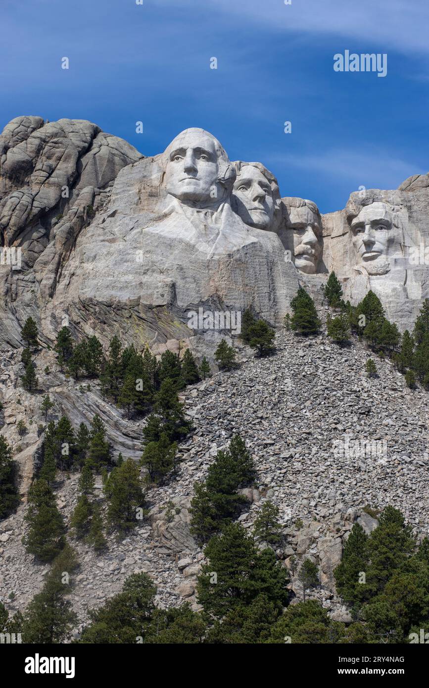 Mount Rushmore National Memorial is a colossal sculpture carved into ...