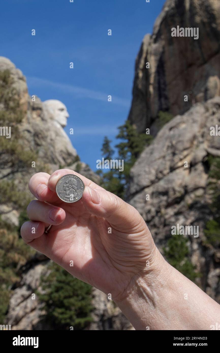 Mount Rushmore National Memorial is a colossal sculpture carved into the granite face of Mount ...