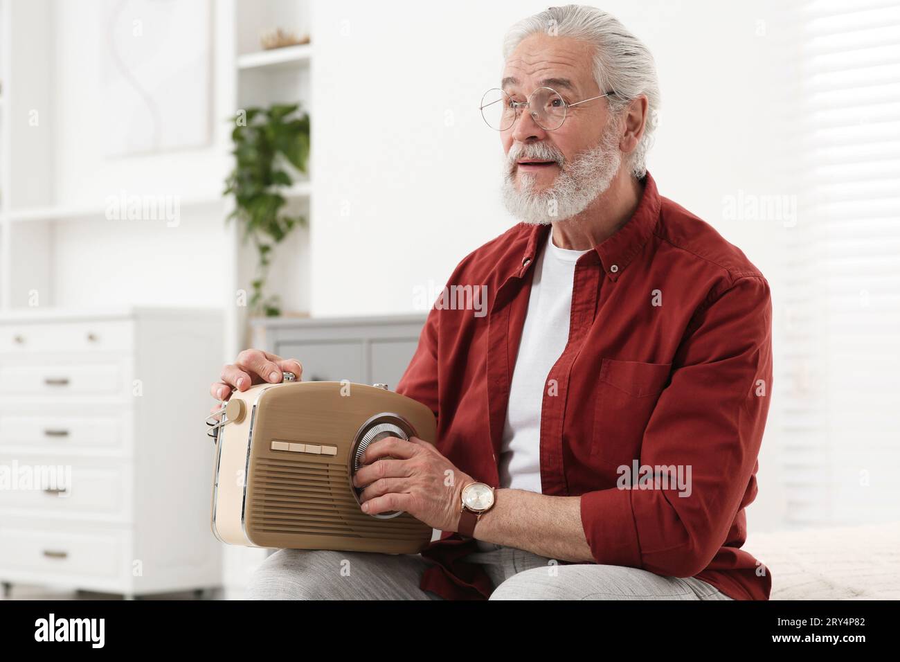 Broadcast radio man listening radio hi-res stock photography and images ...