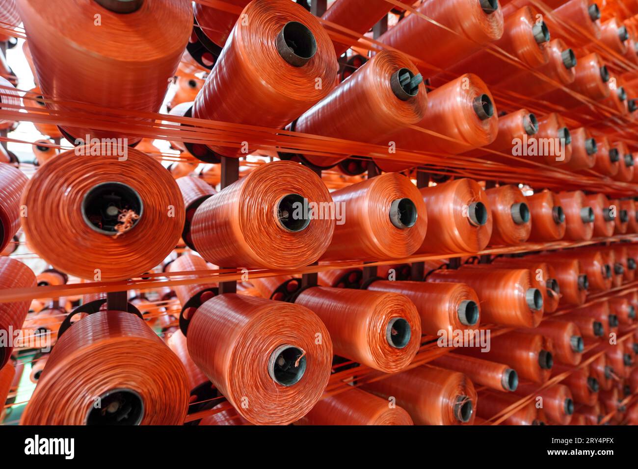Fiber spools on the production line Stock Photo - Alamy