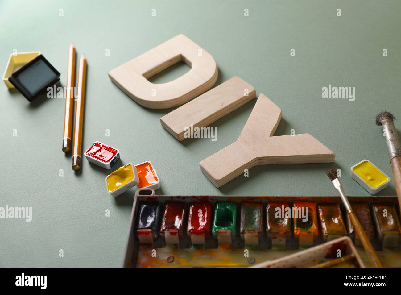 Abbreviation DIY made of letters and different painting supplies on ...