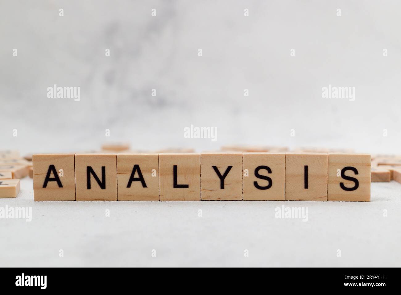 Top view of Analysis word on wooden cube letter block on white ...