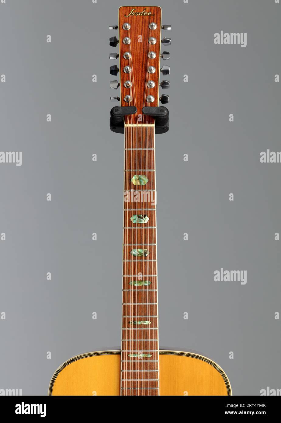 Joodee acoustic 12-string guitar, close-up on top half, neck and ...