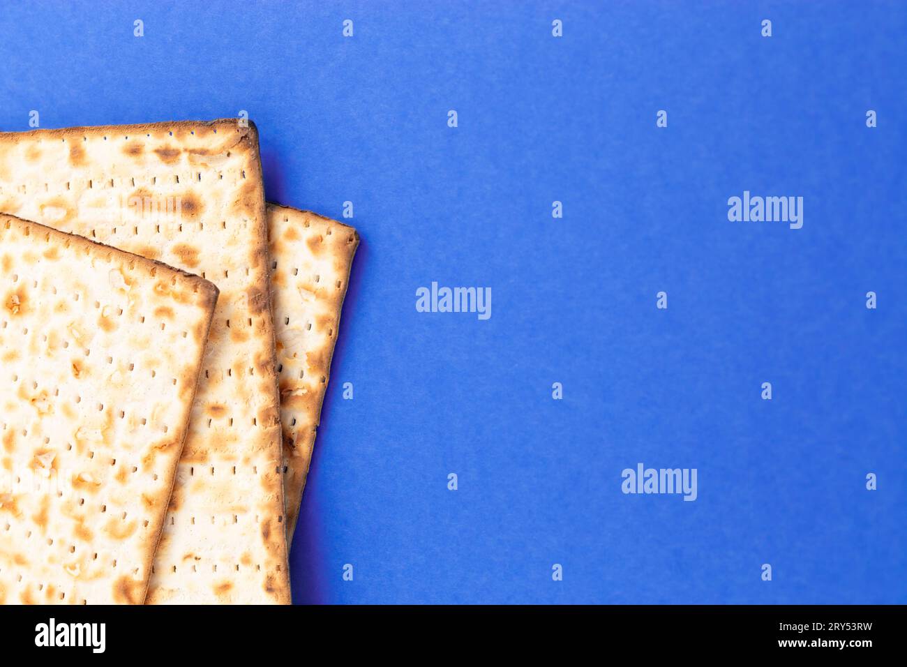Pieces of Matzah Bread Unleavened Bread on a Bright Blue Background ...