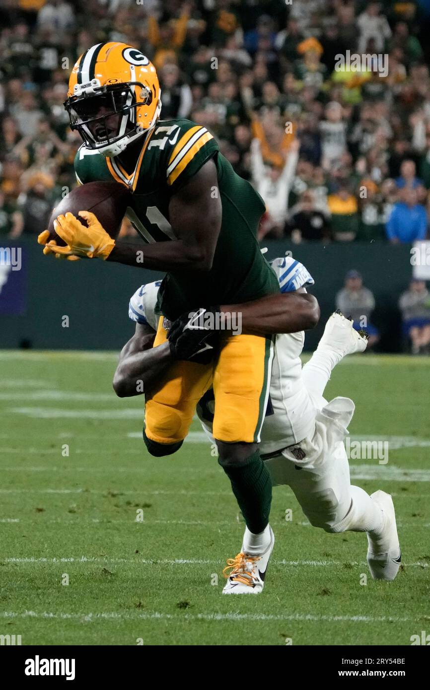 Green Bay Packers wide receiver Jayden Reed (11) catches a pass ahead ...
