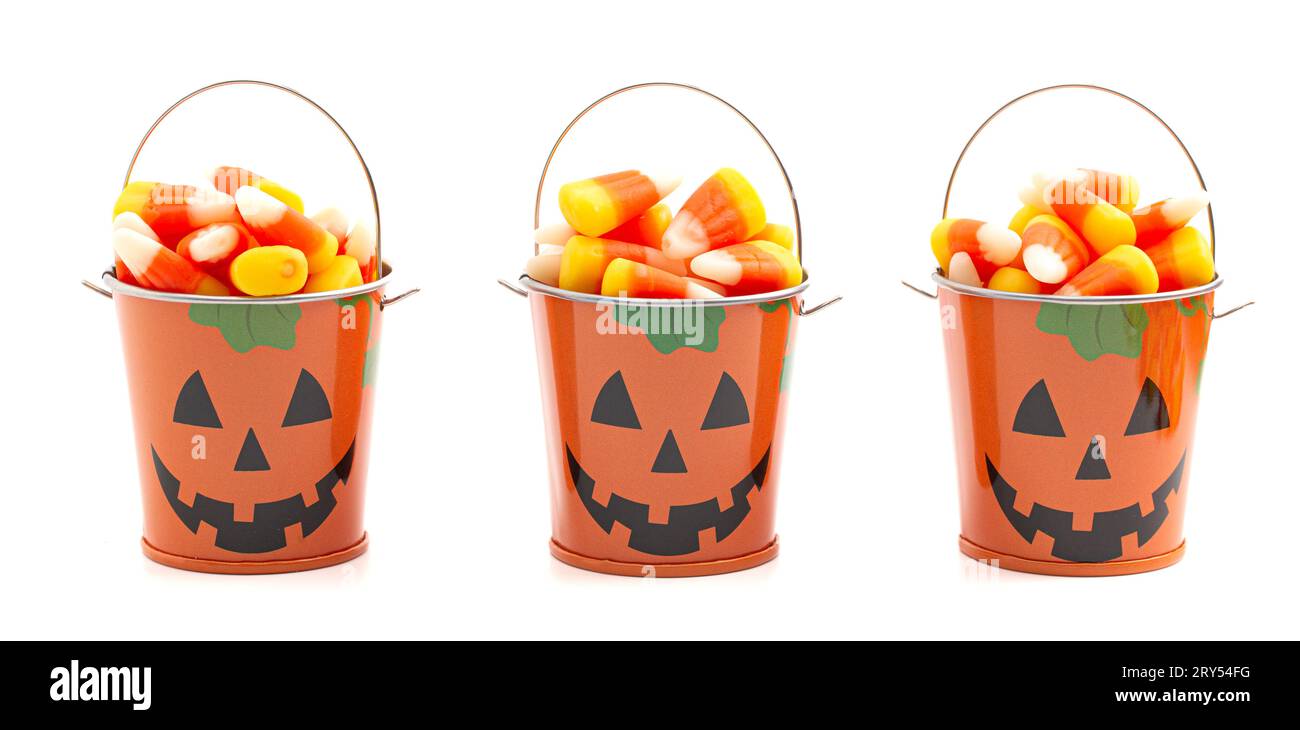 Tin Pumpkin Jack O Lantern Bucket FIlled with Candy Corn Isolated on a ...