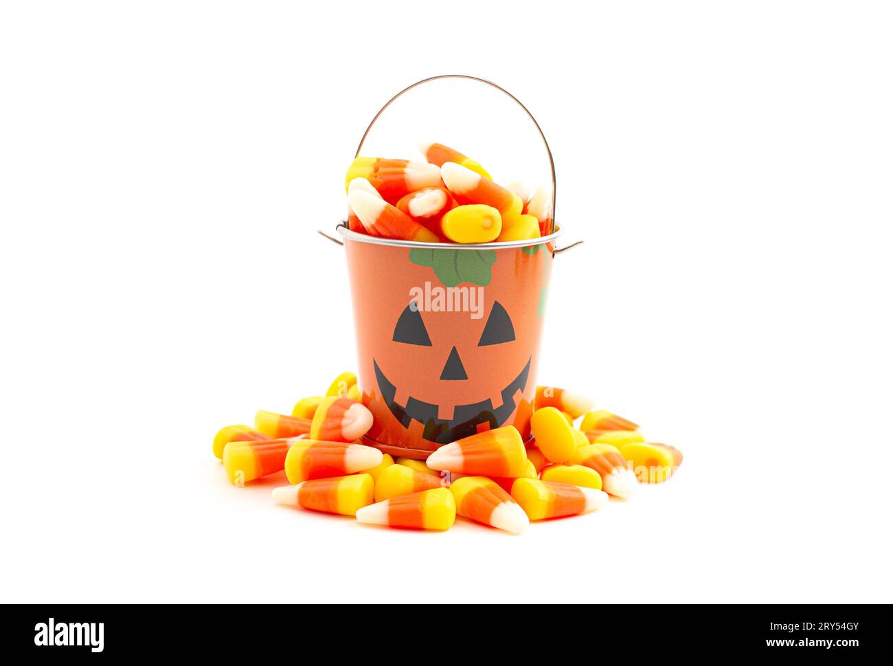 Tin Pumpkin Jack O Lantern Bucket FIlled with Candy Corn Isolated on a ...