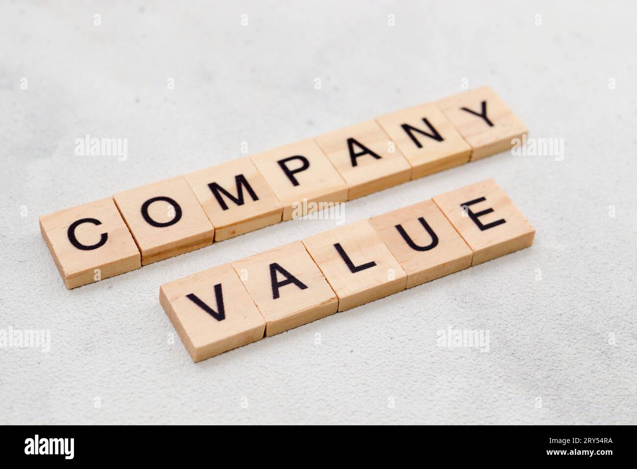 Top view of Company Value word on wooden cube letter block on white ...