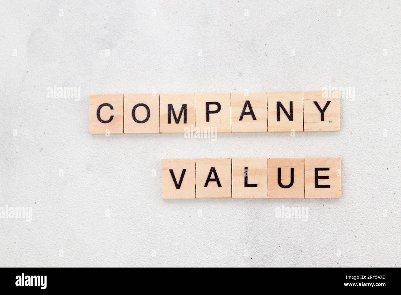 Top view of Company Value word on wooden cube letter block on white ...