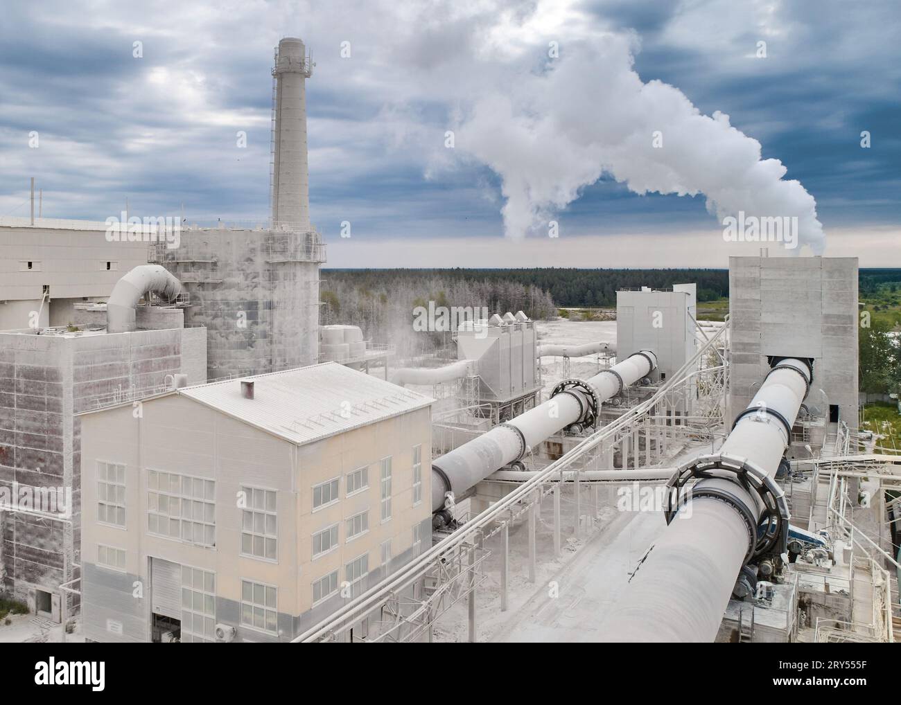 Calx roasting rotating furnace with pipe and steam at plant Stock Photo ...