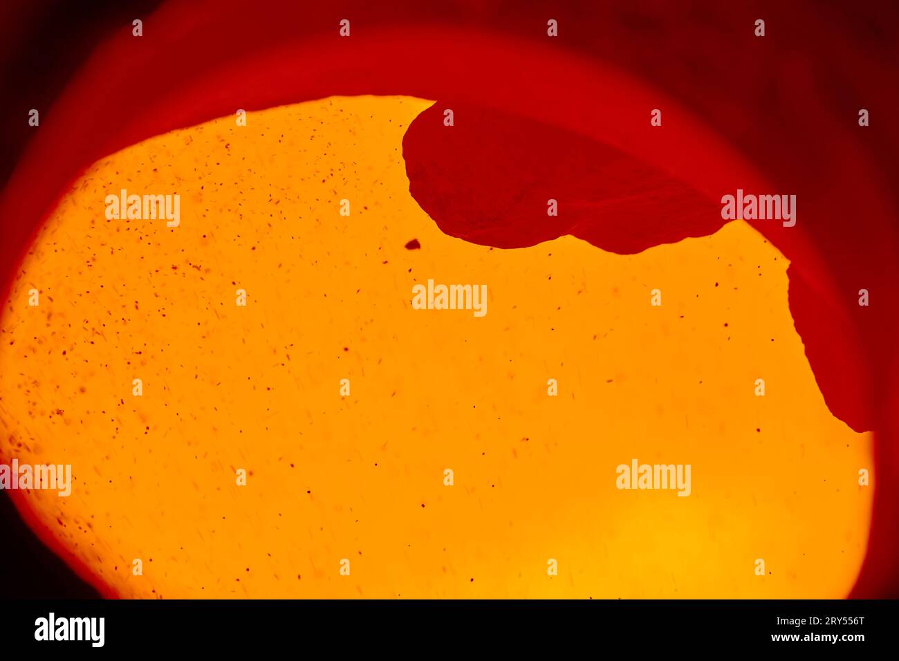 Tiny particles of limestone fly in hot gas flows in furnace Stock Photo ...
