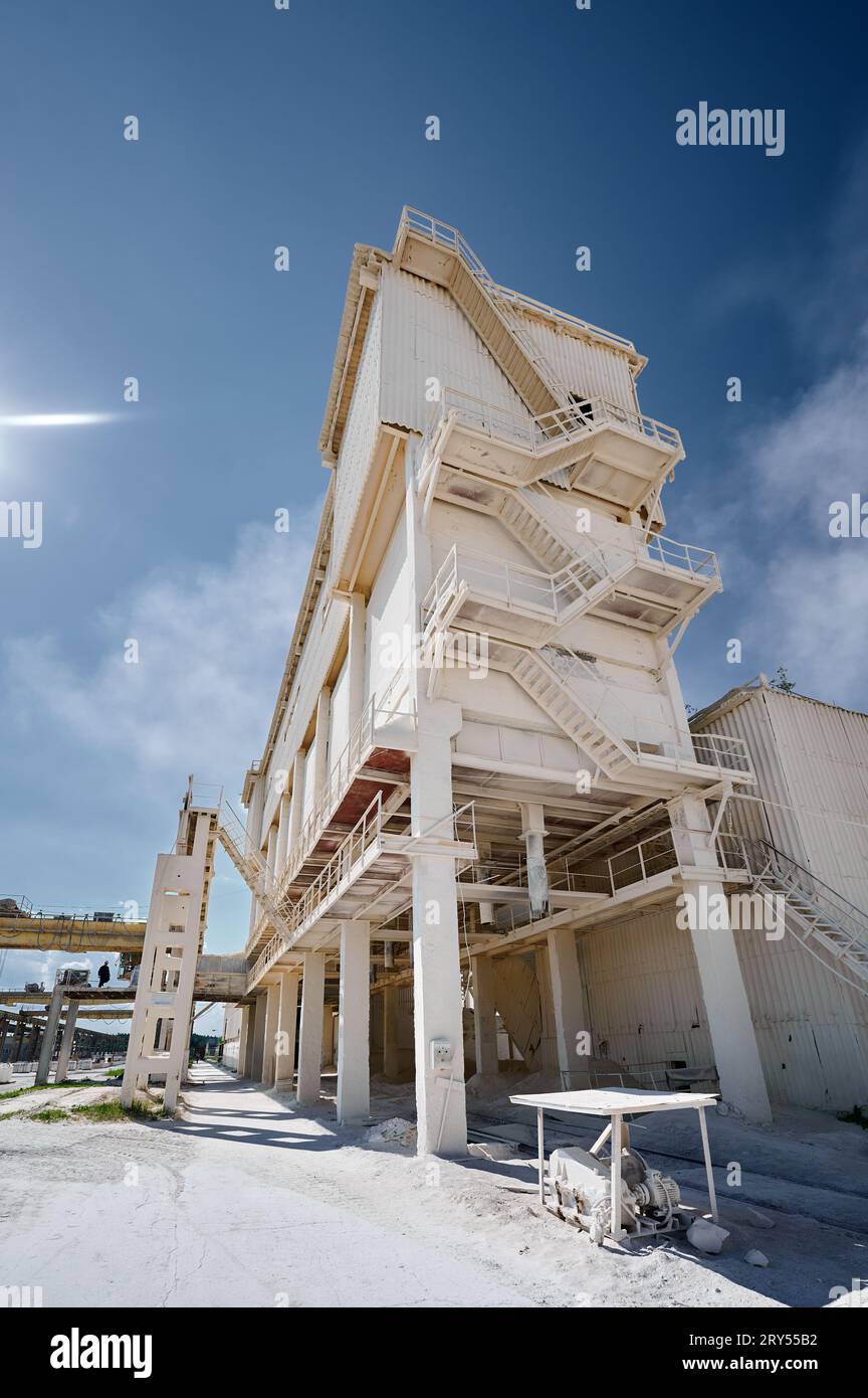 Lime loading unit for railway cars at plant against blue sky Stock ...