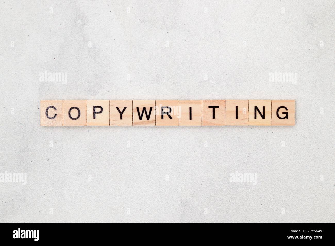 Top view of Copywriting word on wooden cube letter block on white ...