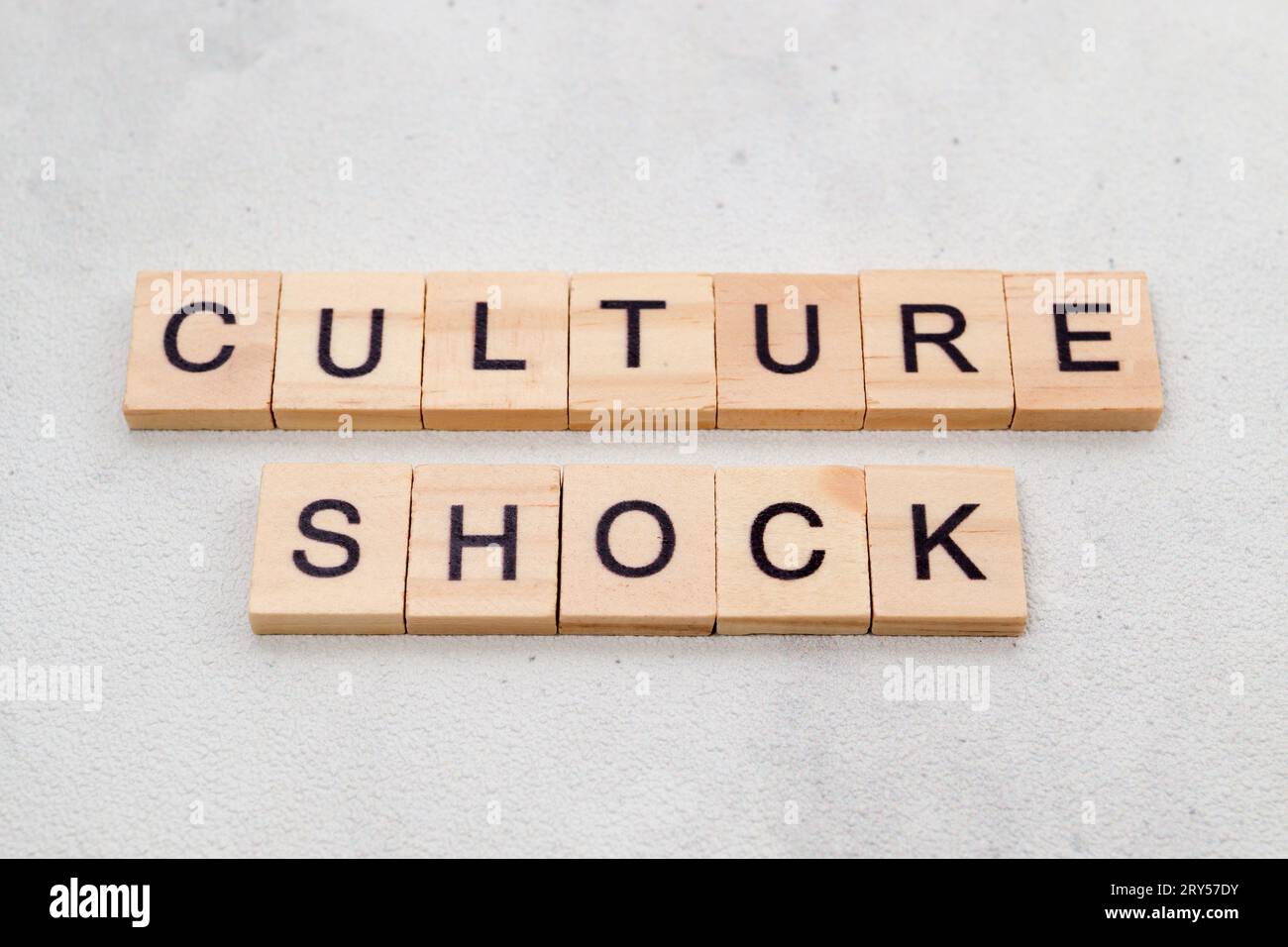 Top view of Culture Shock word on wooden cube letter block on white ...