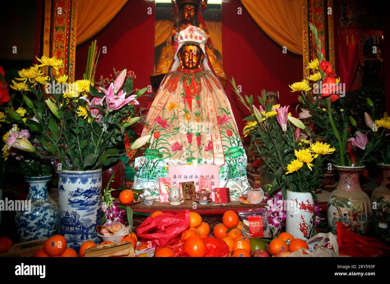 Offerings placed before Kuan Yin at New Year, she is the Chinese ...