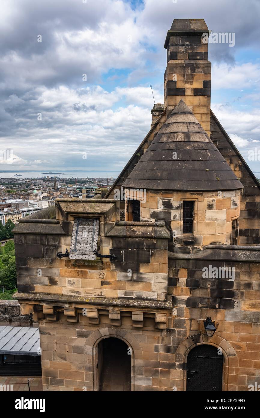 Old stone buildings of Edinburgh Castle overlooking the city in the ...