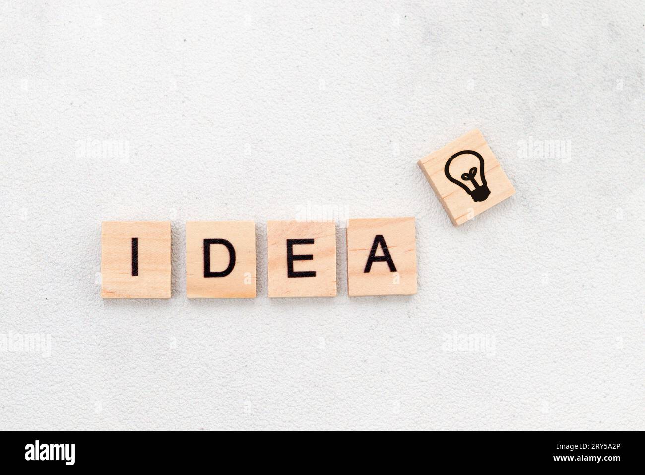 Top view of Idea word on wooden cube letter block on white background ...