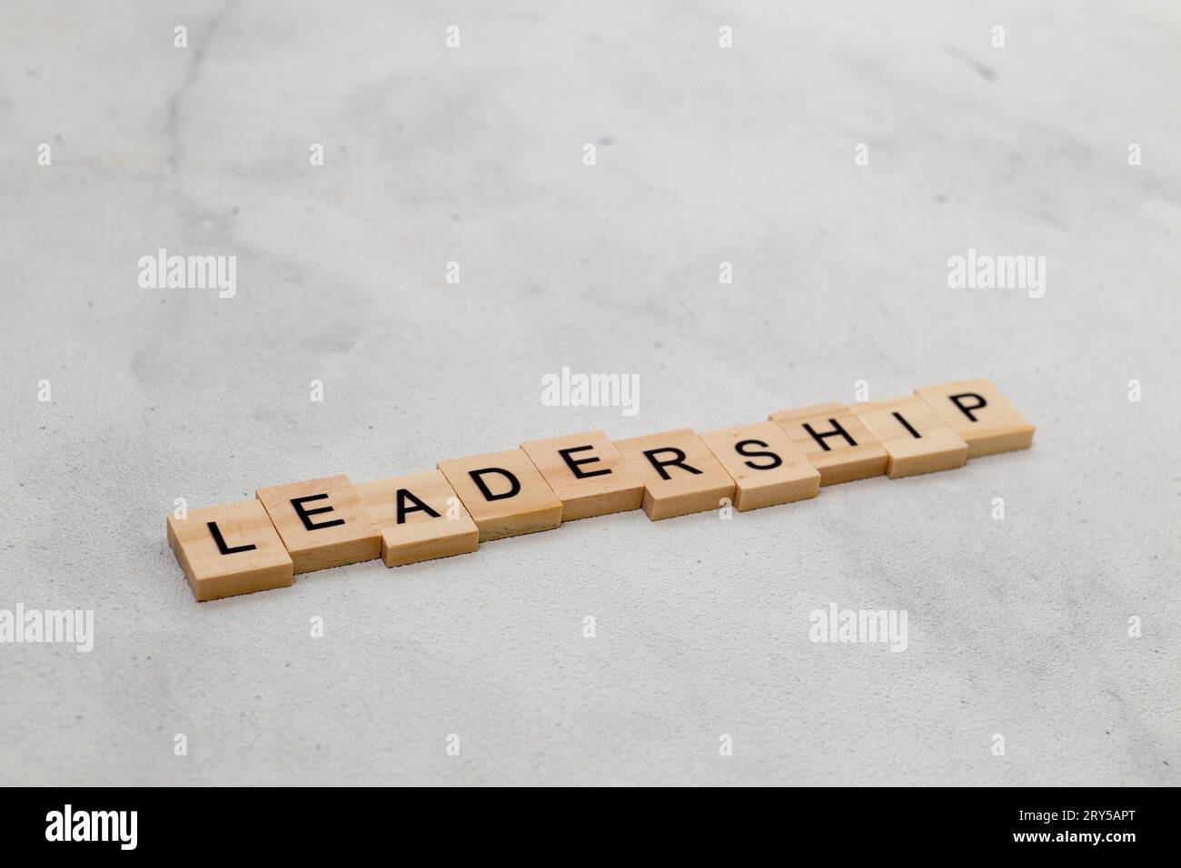 Top view of Leadership word on wooden cube letter block on white ...