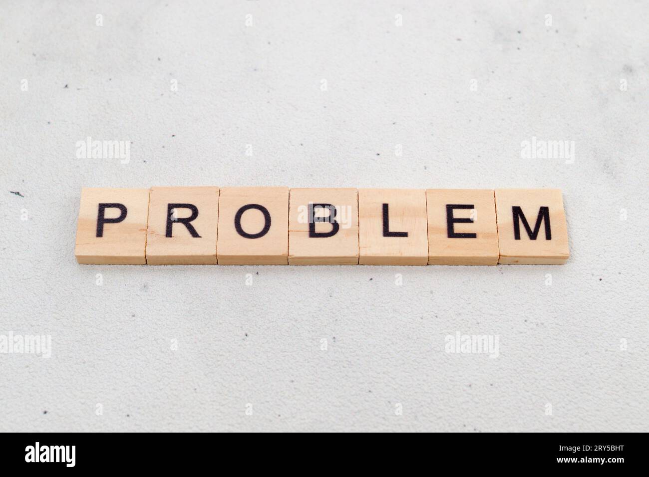 Top view of Problem word on wooden cube letter block on white ...