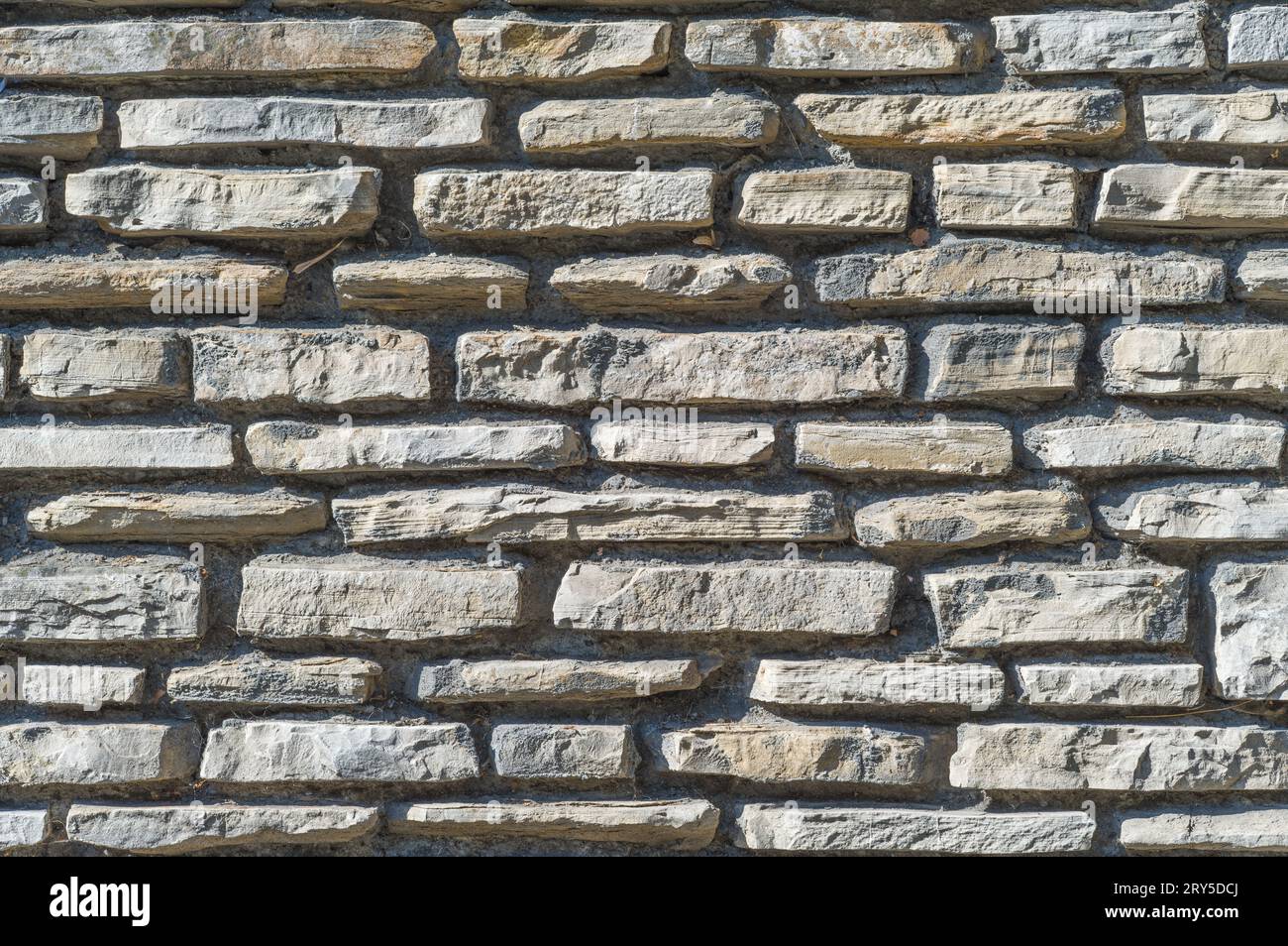Stone tile dividing wall Stock Photo - Alamy