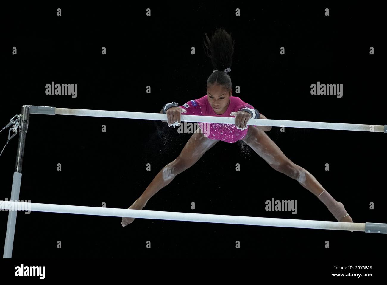 United States' Shilese Jones practices on the uneven bars during podium ...