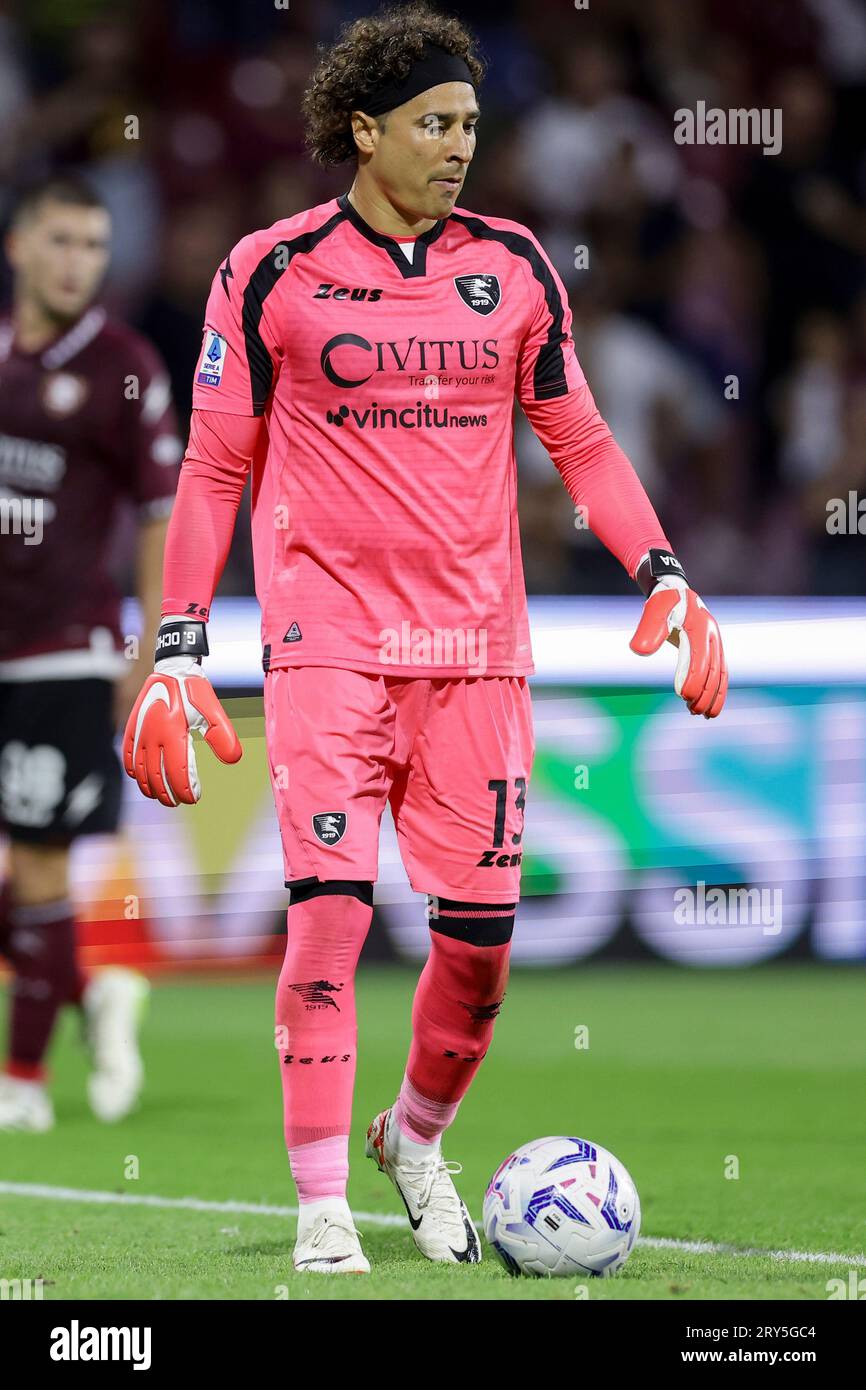 Salernitana's Mexican goalkeeper Guillermo Ochoa controls the ball ...