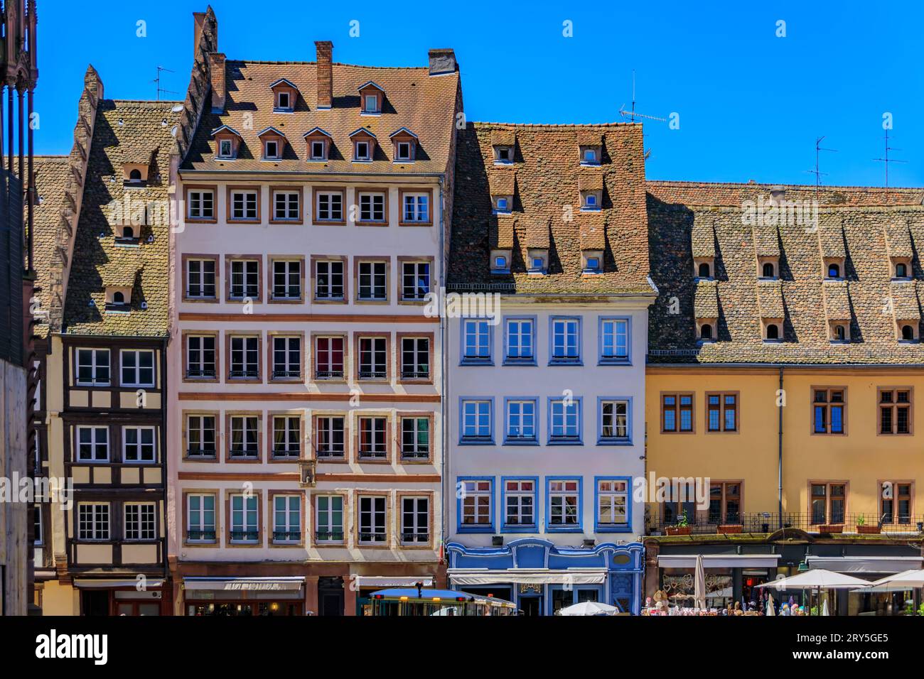 Ornate traditional half timbered houses with steep roofs on Cathedral ...