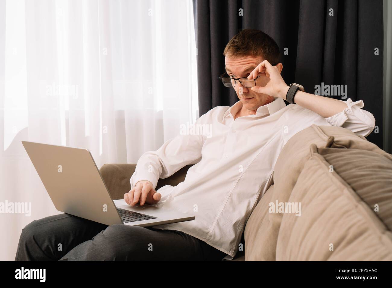 Man staring laptop screen hi-res stock photography and images - Alamy