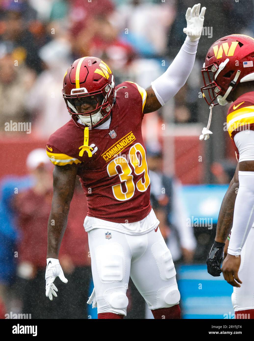 Washington Commanders Safety Jeremy Reaves (39) dancing with teammates ...