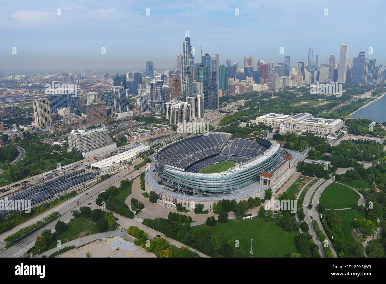 A general overall aerial view of Soldier Field and downtown skyline ...