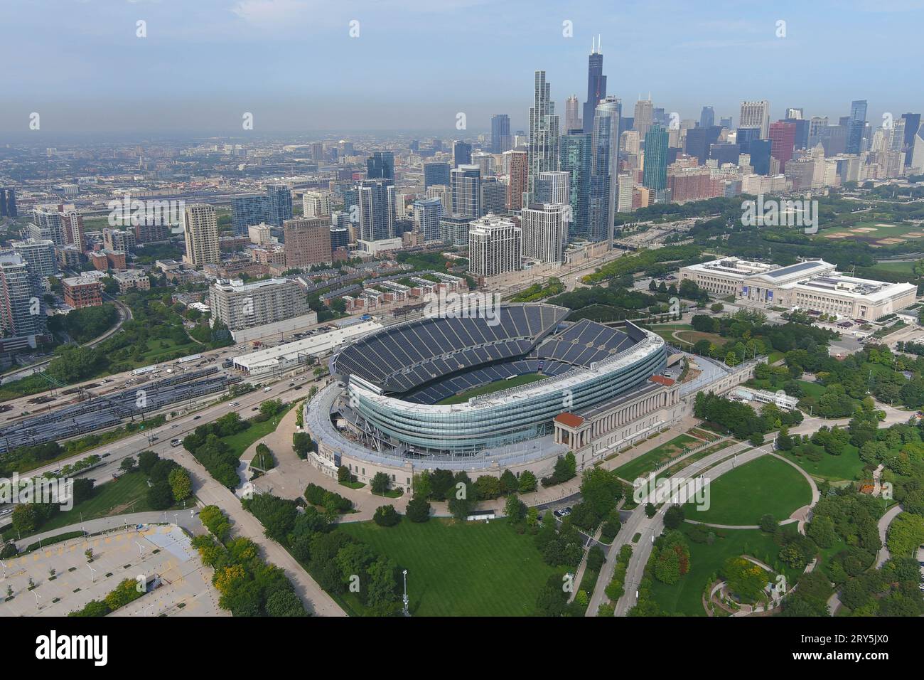 A general overall aerial view of Soldier Field and downtown skyline ...
