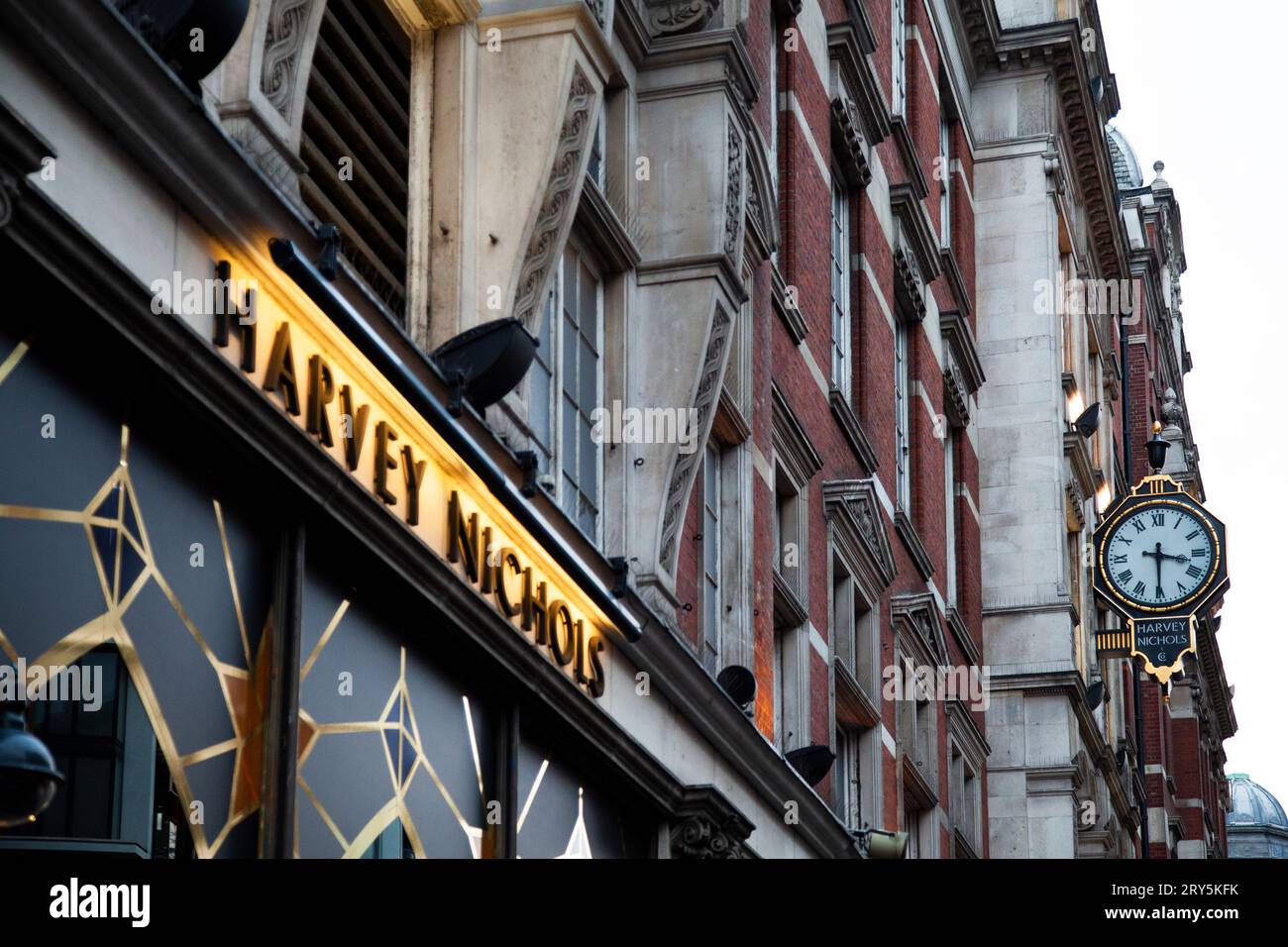 Harvey nichols shop front with gold clock hi-res stock photography and ...