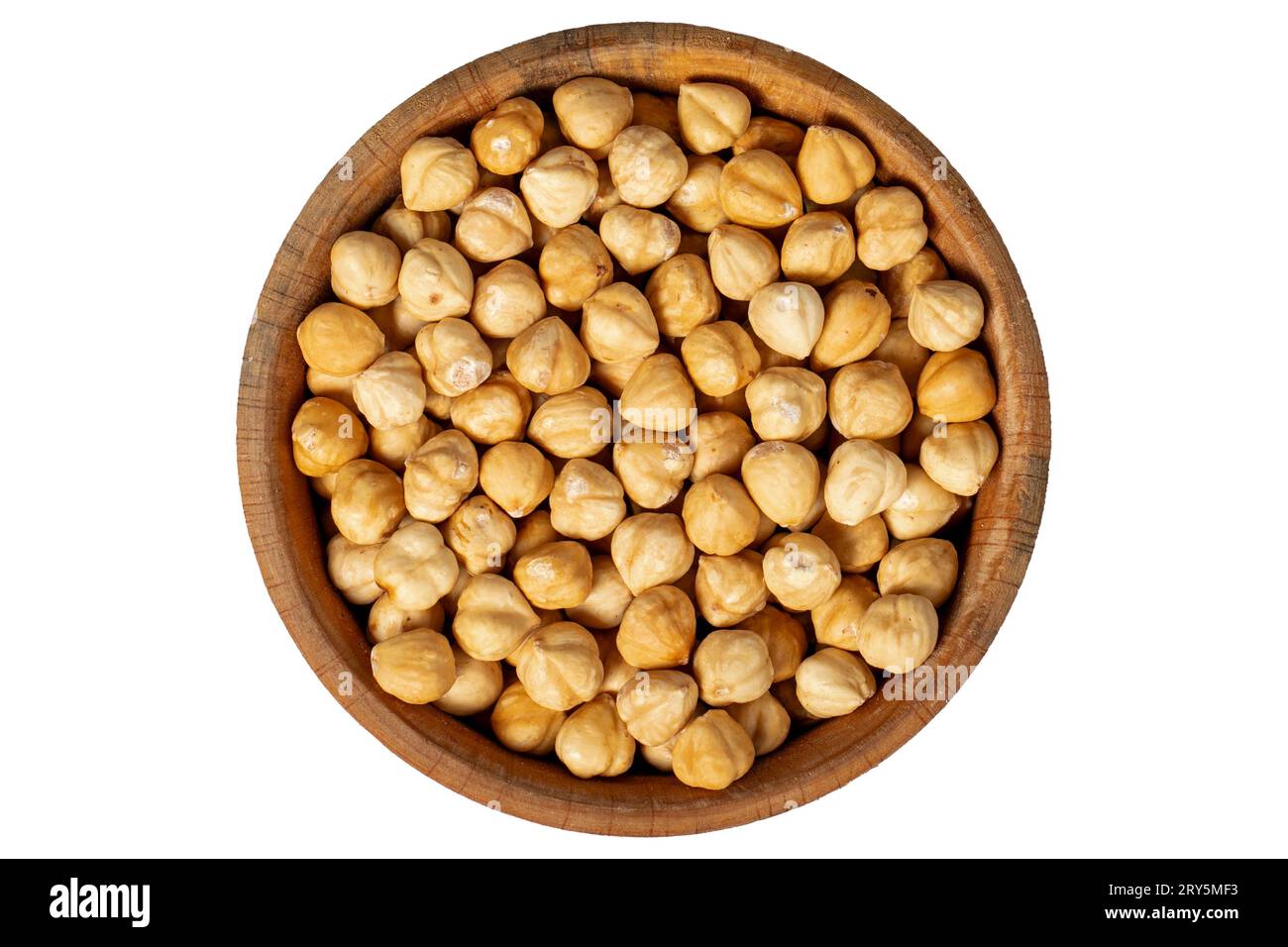 Roasted hazelnuts in wood bowl. Peeled hazelnuts kernel isolated on ...