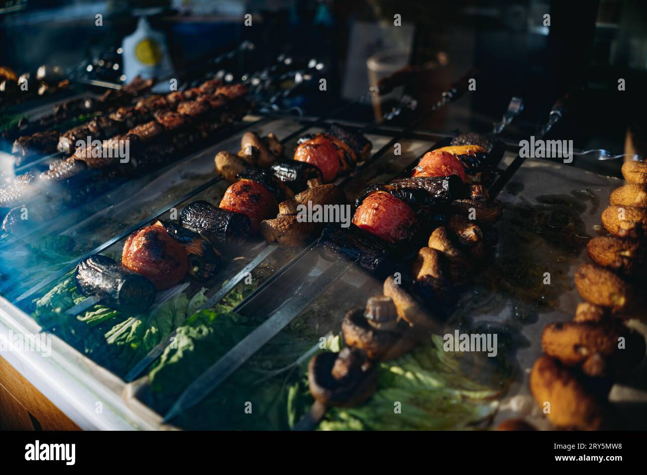 traditional caucasian shish kebab at street food market. grilled ...