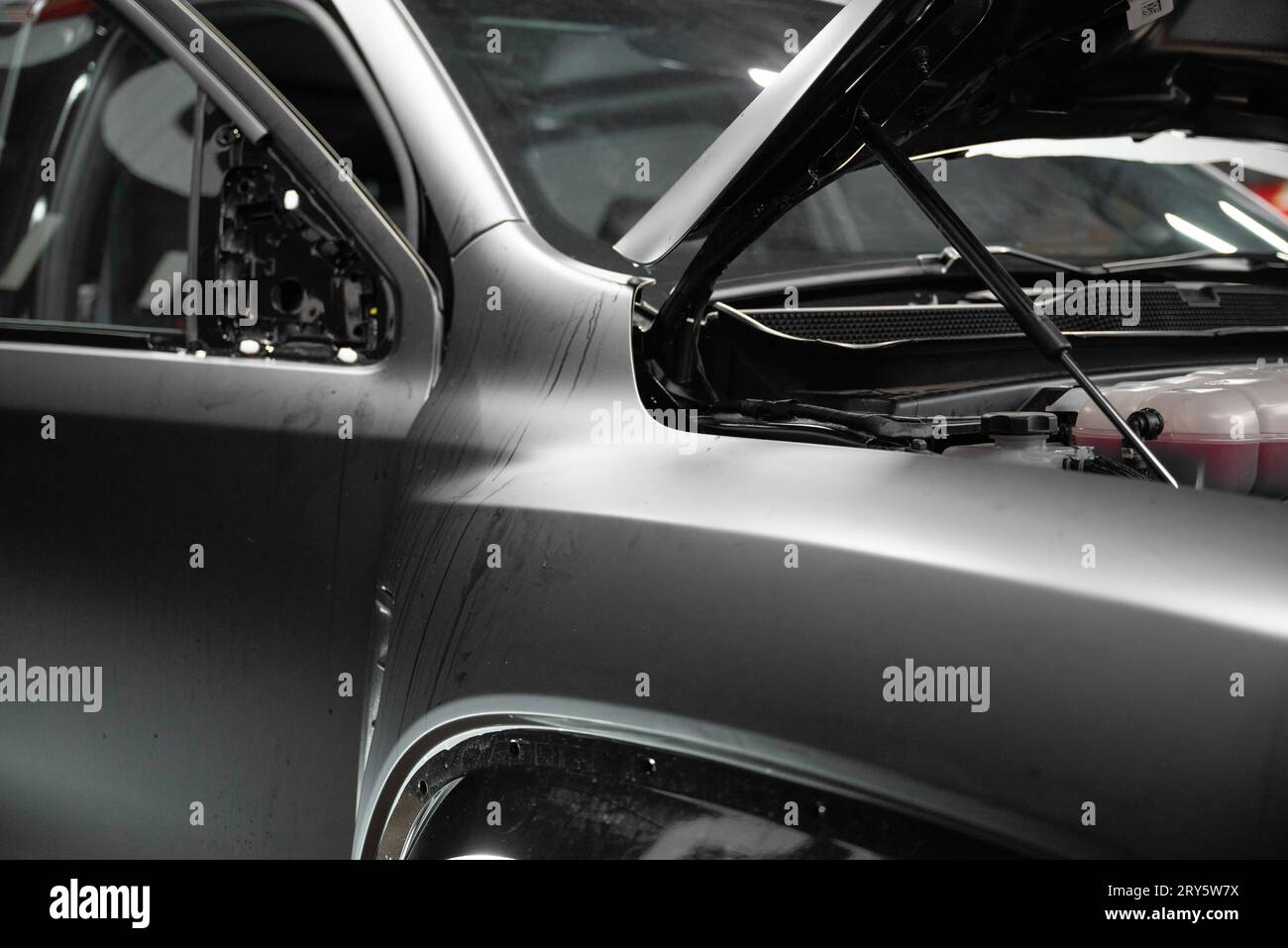 Installation of a protective paint and varnish matte film on the car ...