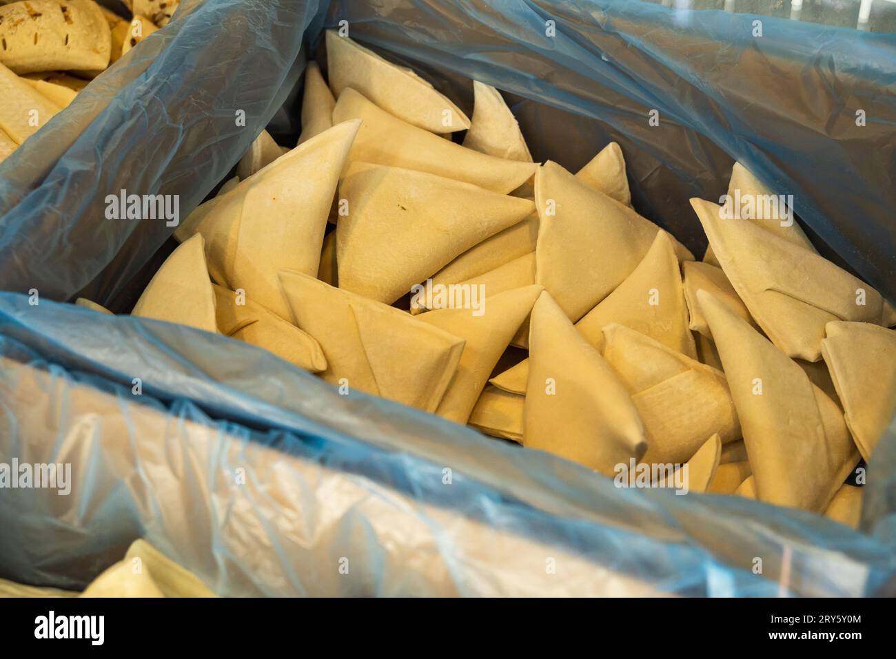 Semi-finished sweet triangle buns in the refrigerator compartment with ...