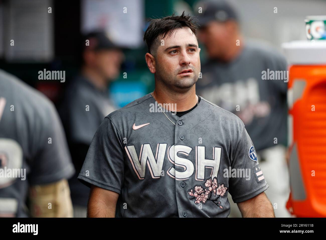 Washington Nationals third baseman Jake Alu (39) walks in the dugout ...