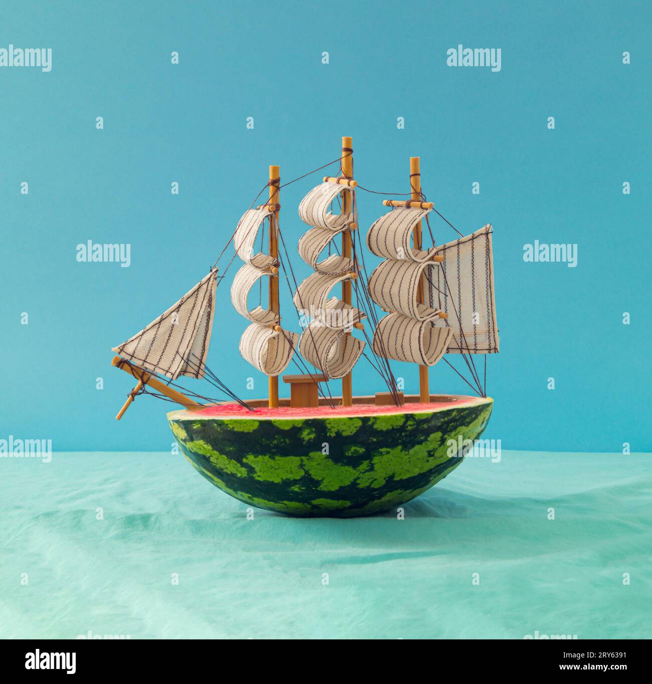 Watermelon sailboat traveling at the ocean. Sea ship made of watermelon ...