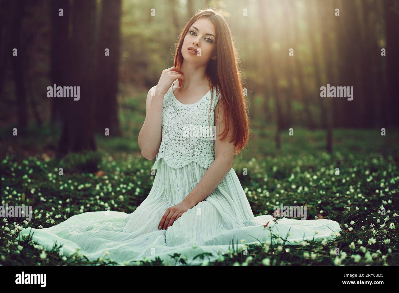 Beautiful and romantic bride among wild flowers Stock Photo - Alamy