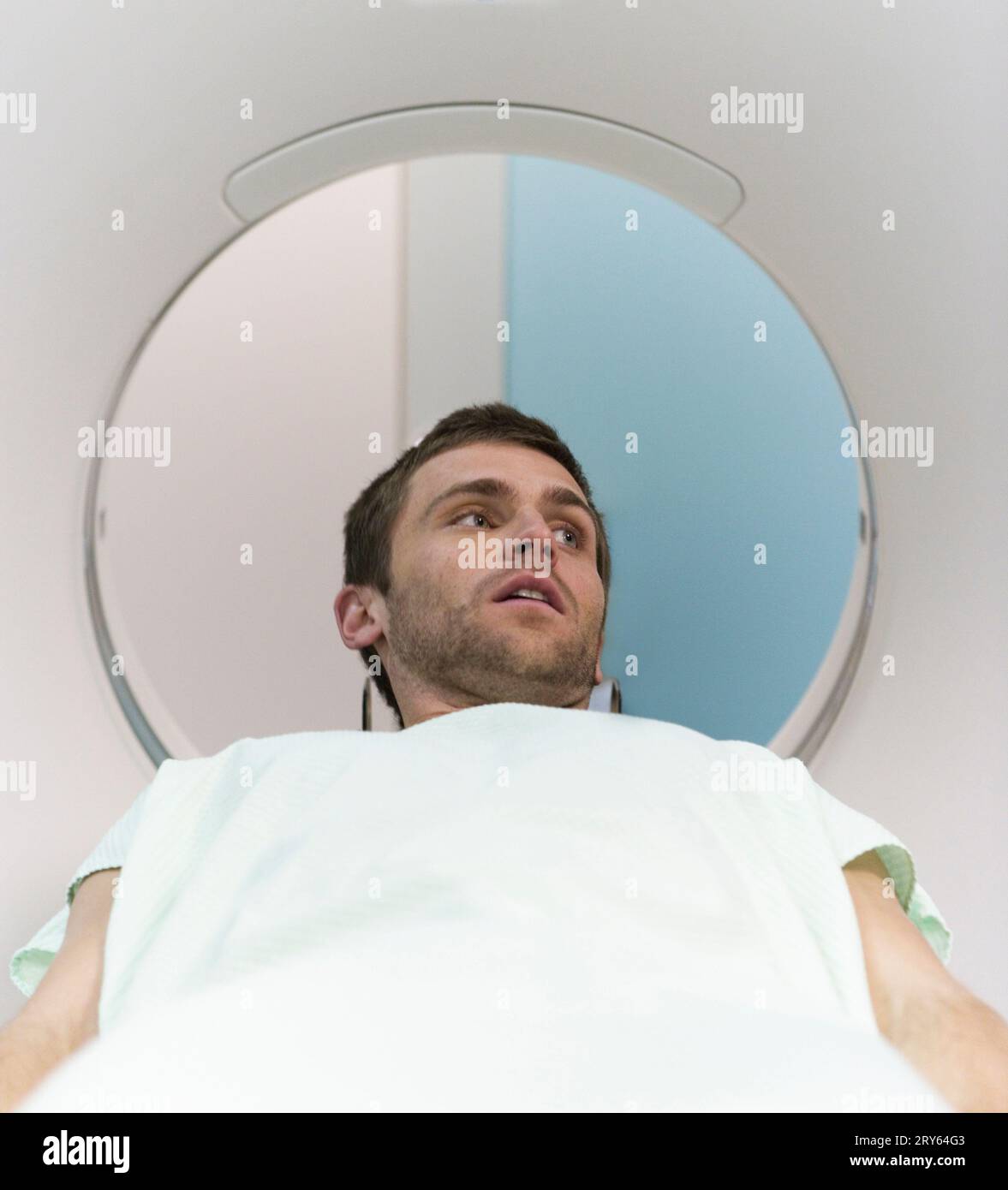 Anxious looking male patient hi-res stock photography and images - Alamy